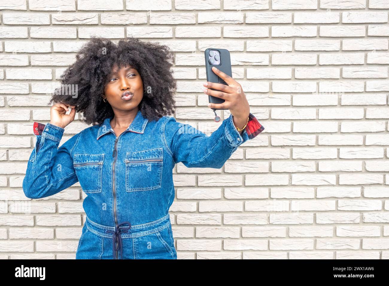 This vibrant image captures a young African American woman in a trendy ...