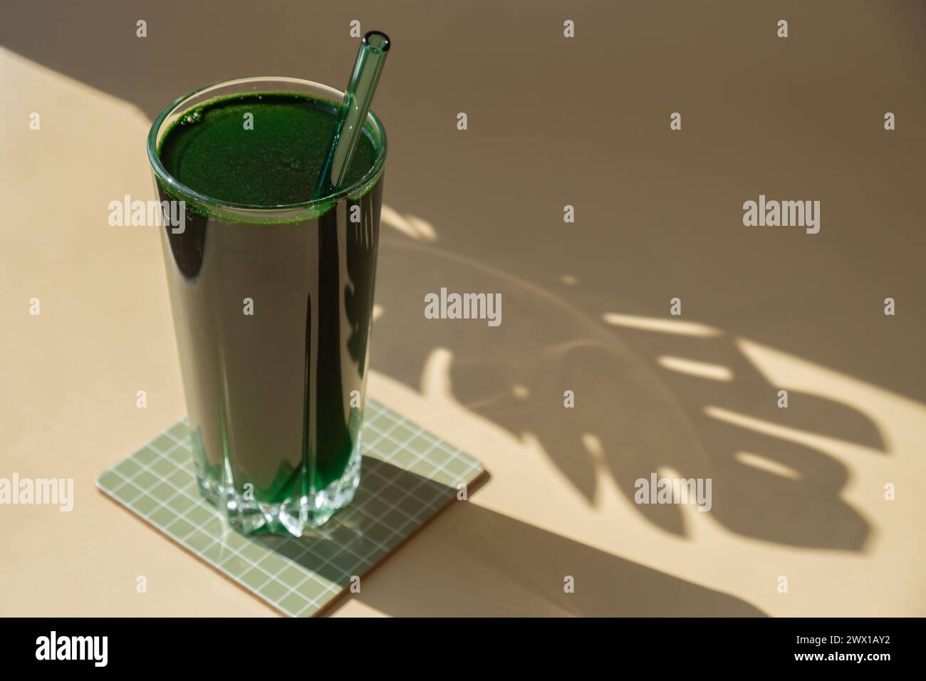 Organic blue-green algae spirulina detox drink in glass powder food ...