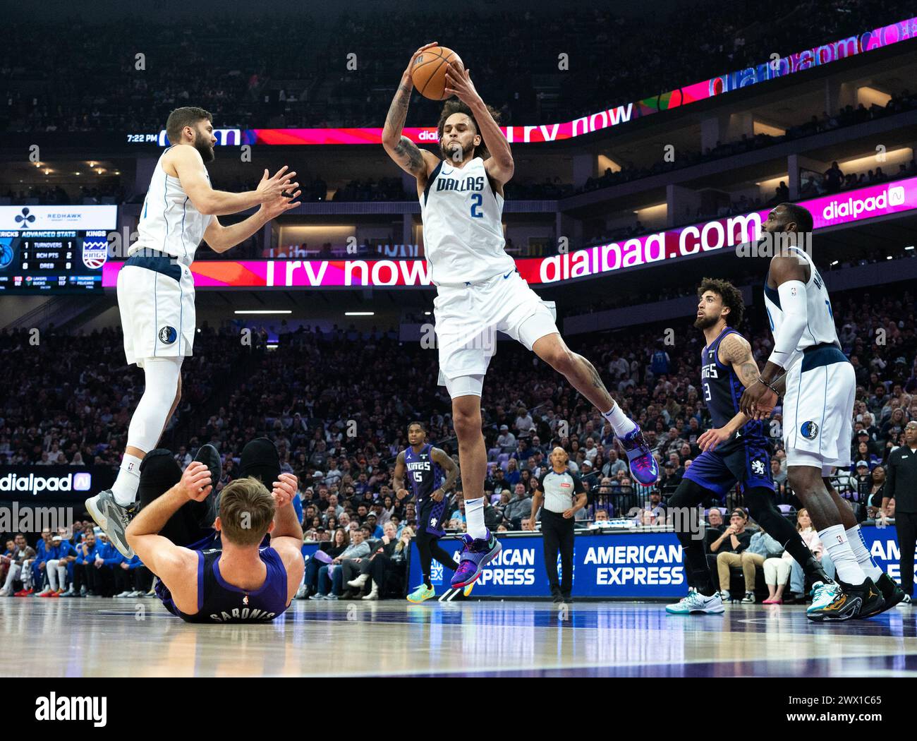 Sacramento, Ca, USA. 26th Mar, 2024. Dallas Mavericks center Dereck Lively II (2) grabs rebound ...