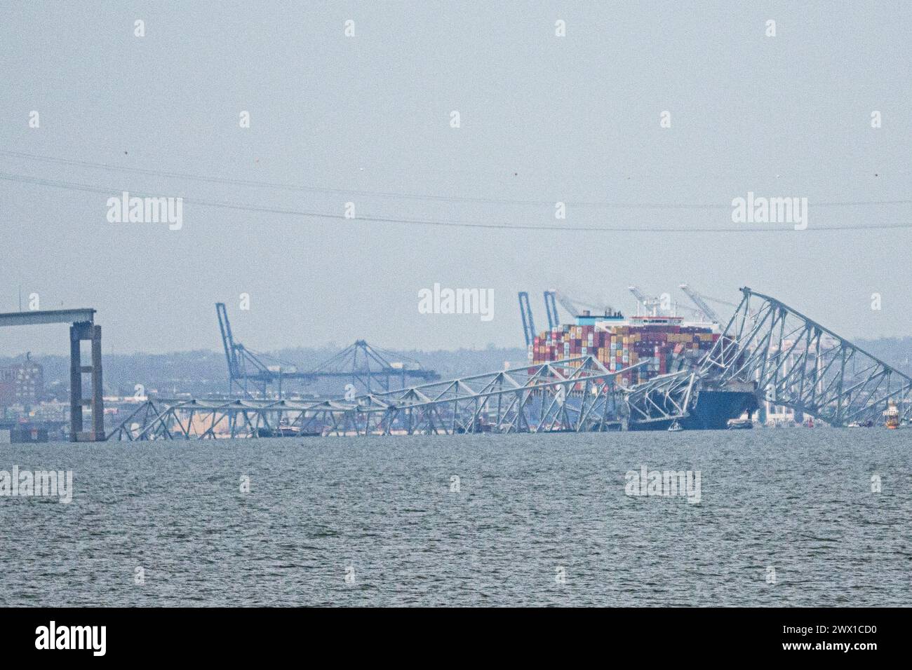 The Dali shipping container vessel is seen the ruins of Francis Scott ...