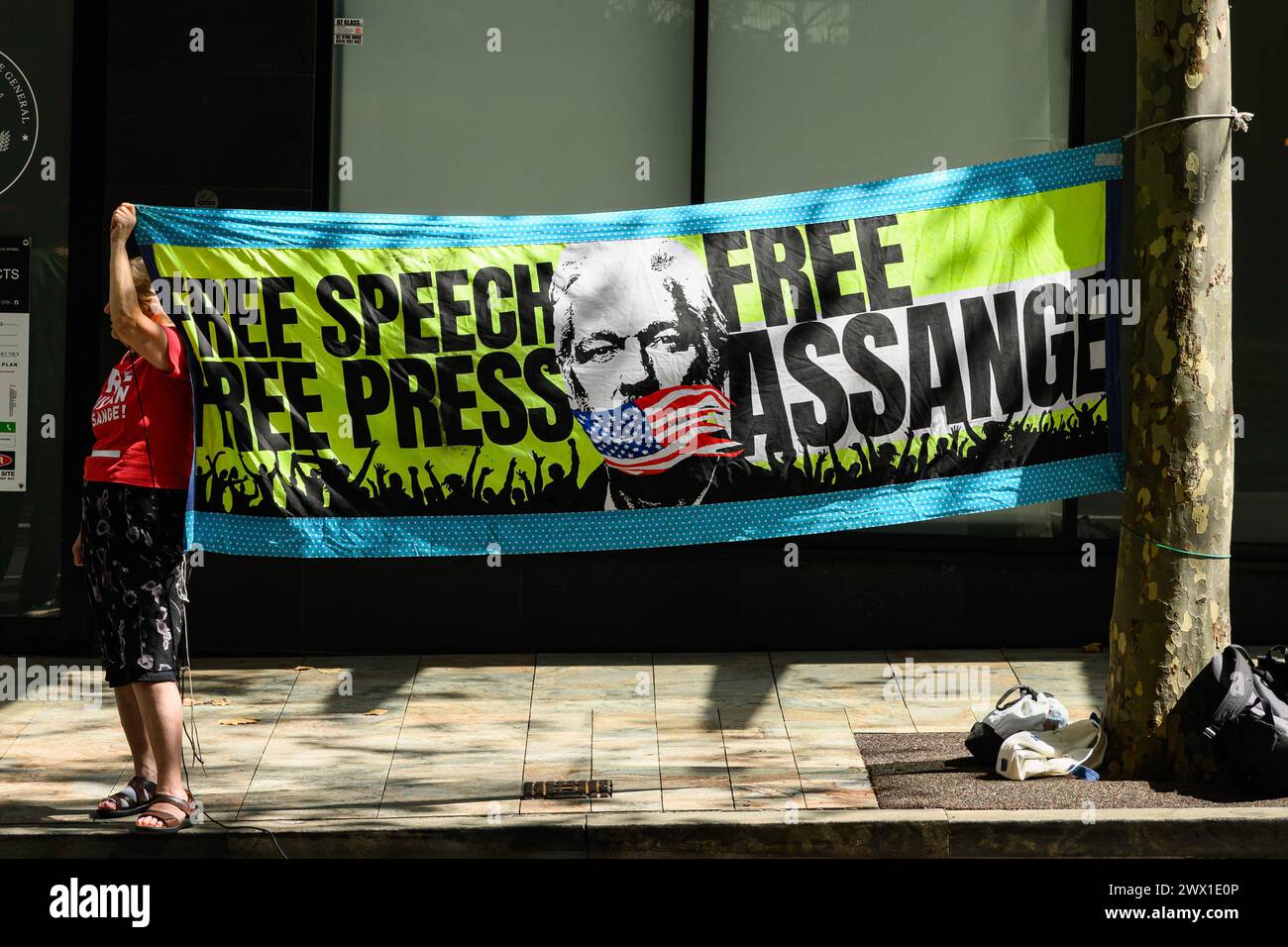 Sydney, Australia. 27th Mar, 2024. A banner depicting Julian Assange ...