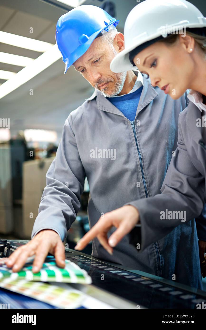 Manager, distribution and printing in factory with people for ...