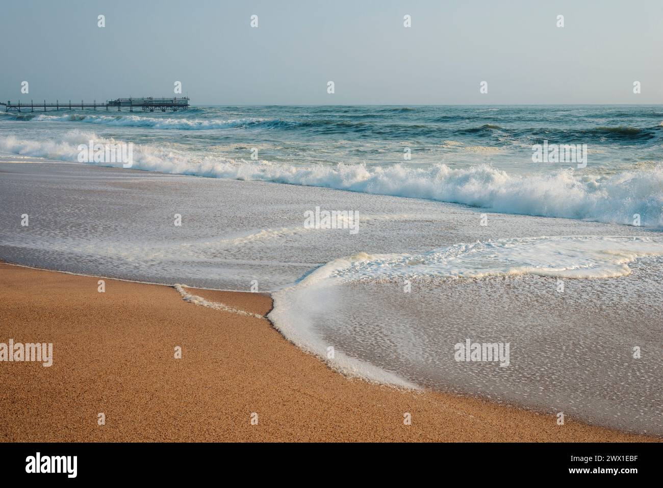 empty sand beach with distant pier in Swakopmund, Namibia Stock Photo ...