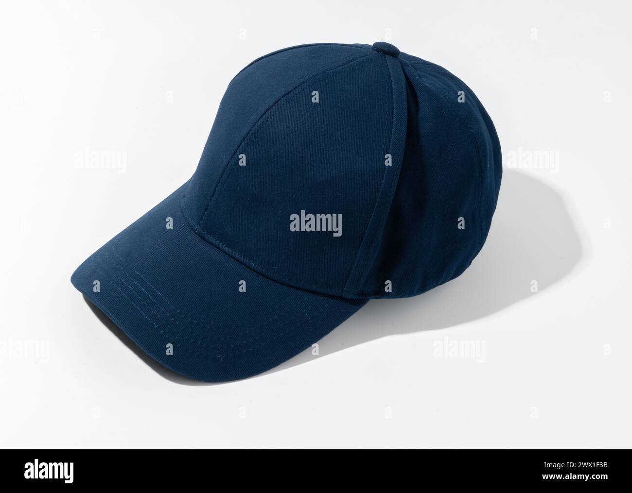 Navy Blue Baseball Cap Positioned on a White Background Stock Photo - Alamy