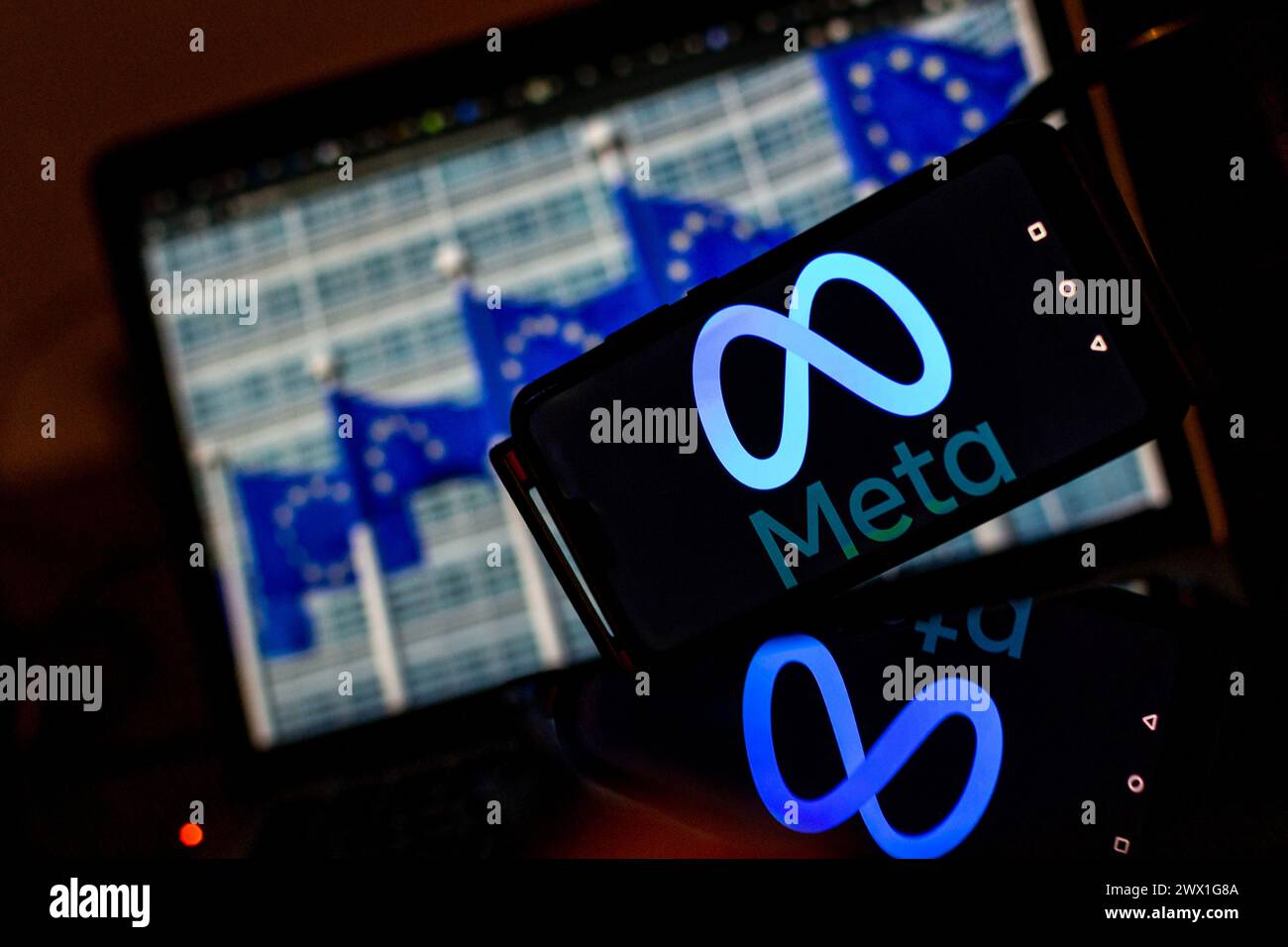 In this photo illustration logo of Meta is seen on a smartphone and ...