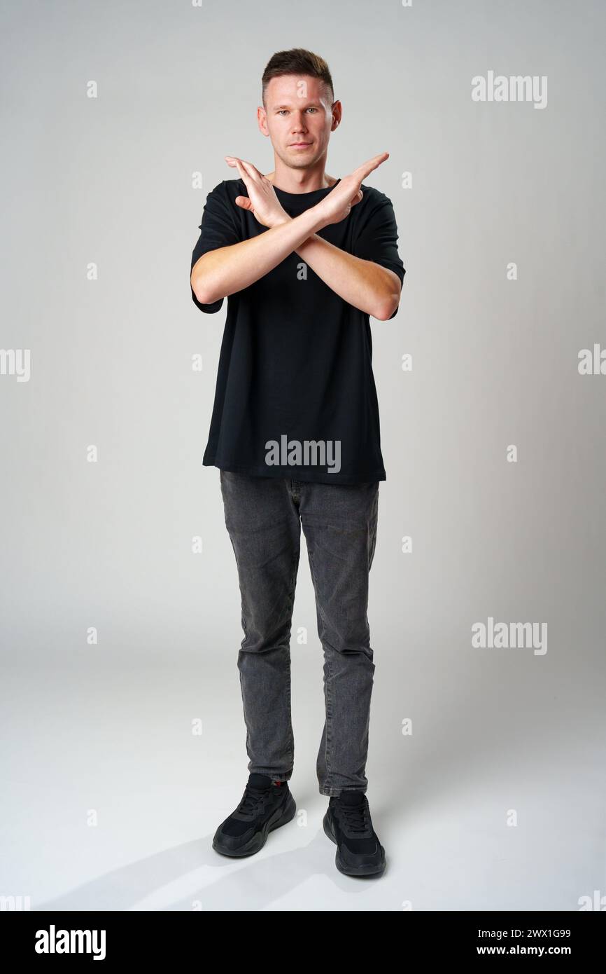Man making x with arms hi-res stock photography and images - Alamy