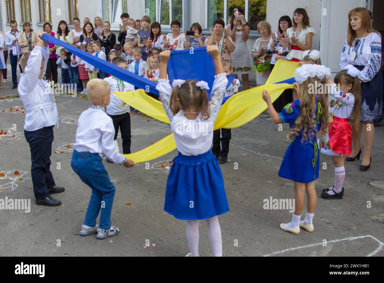 Ukraine, Nova Skvariava,Ukrainian children dance on September 1 in the school yard Stock Photo ...