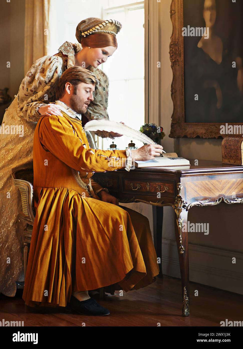 Couple, feather and writing a letter, royal and relax in home for ...