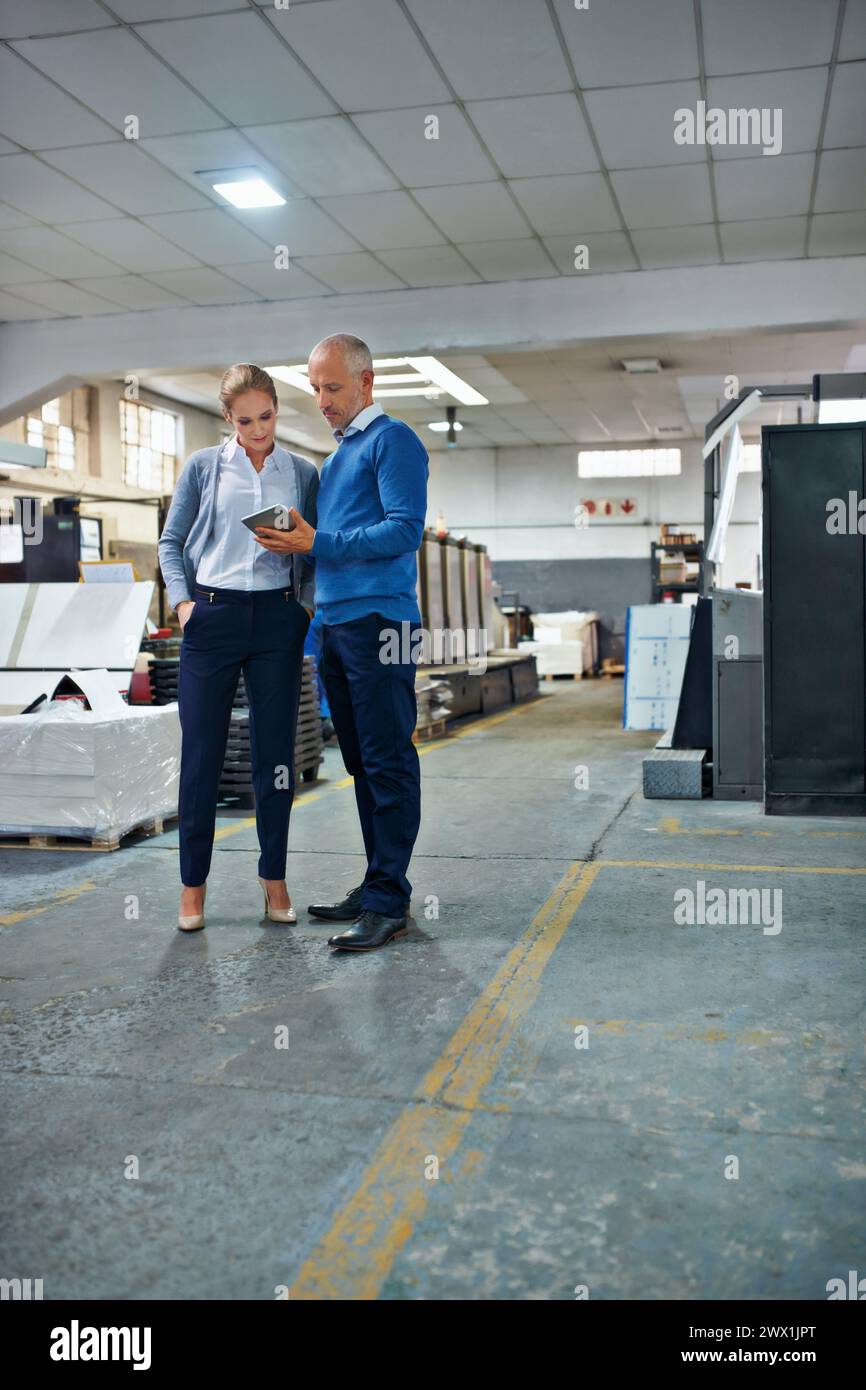 Factory, tablet and people in warehouse for printing, quality control ...