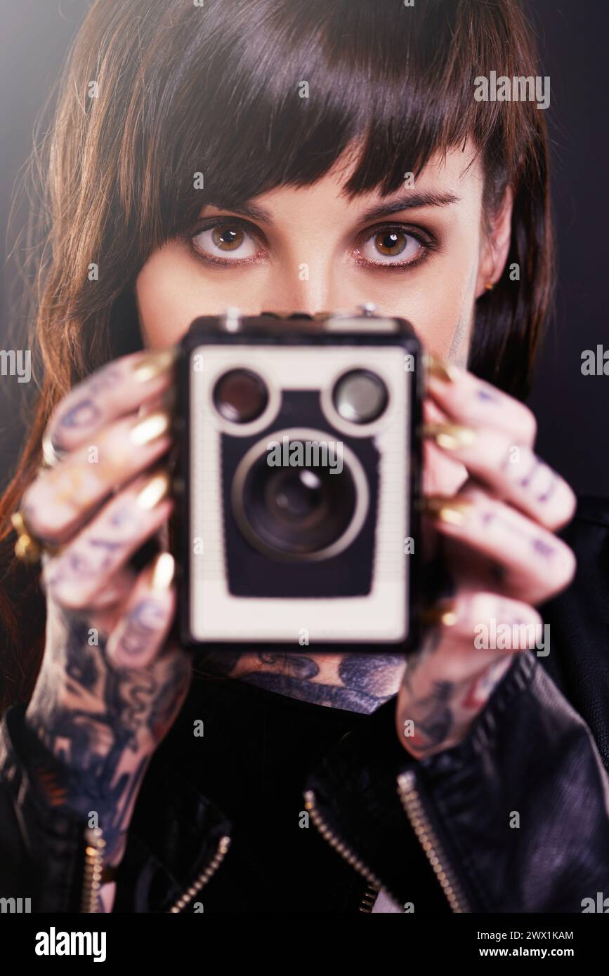 Person, hands and camera with tattoo for vintage, polish and creative ...