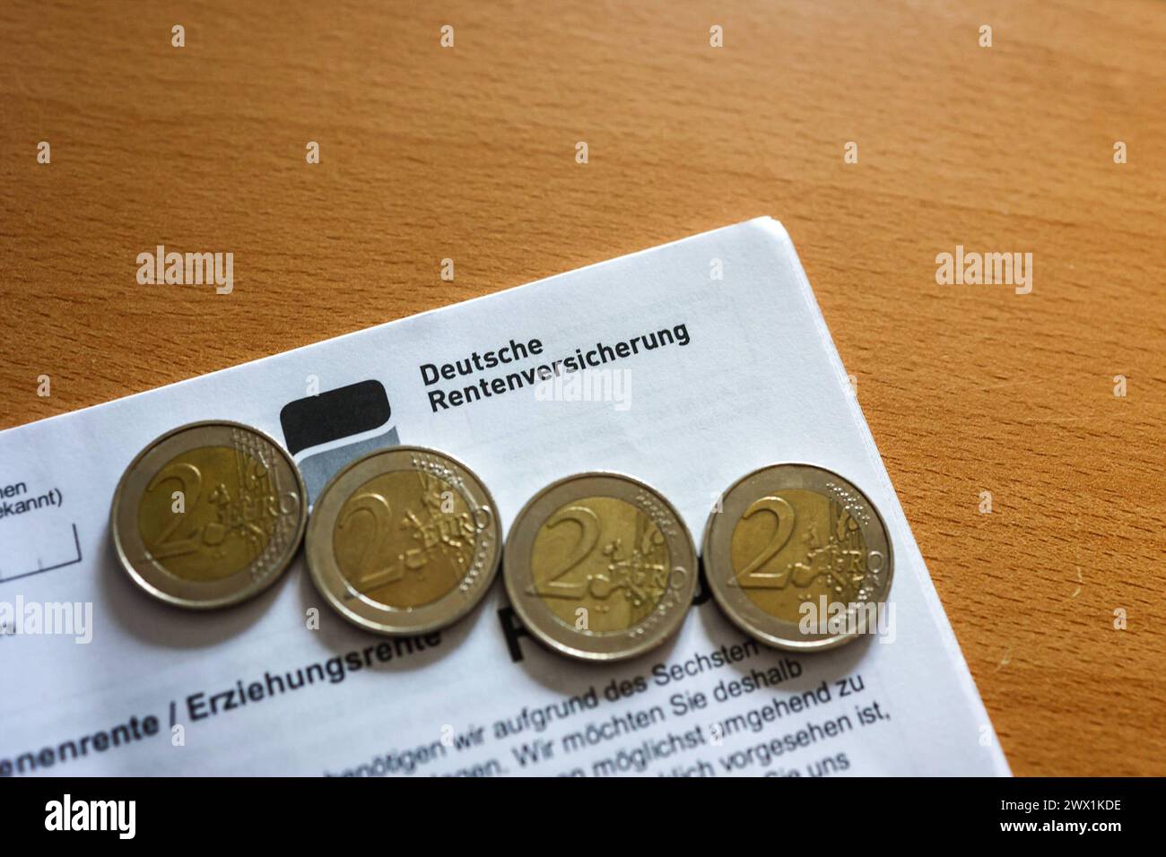 Rentenbescheid mit Münzen *** Pension certificate with coins Copyright ...