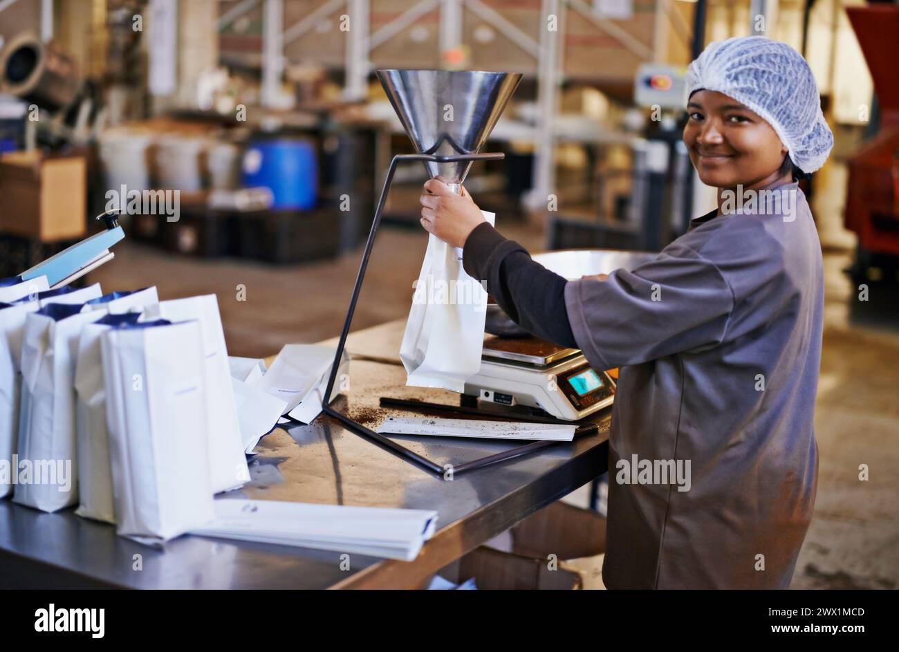 Business, worker and coffee beans packaging in factory with portrait ...