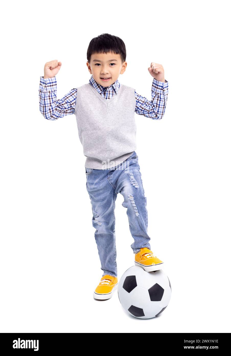 Happy asian Boy standing with football isolated on white background ...