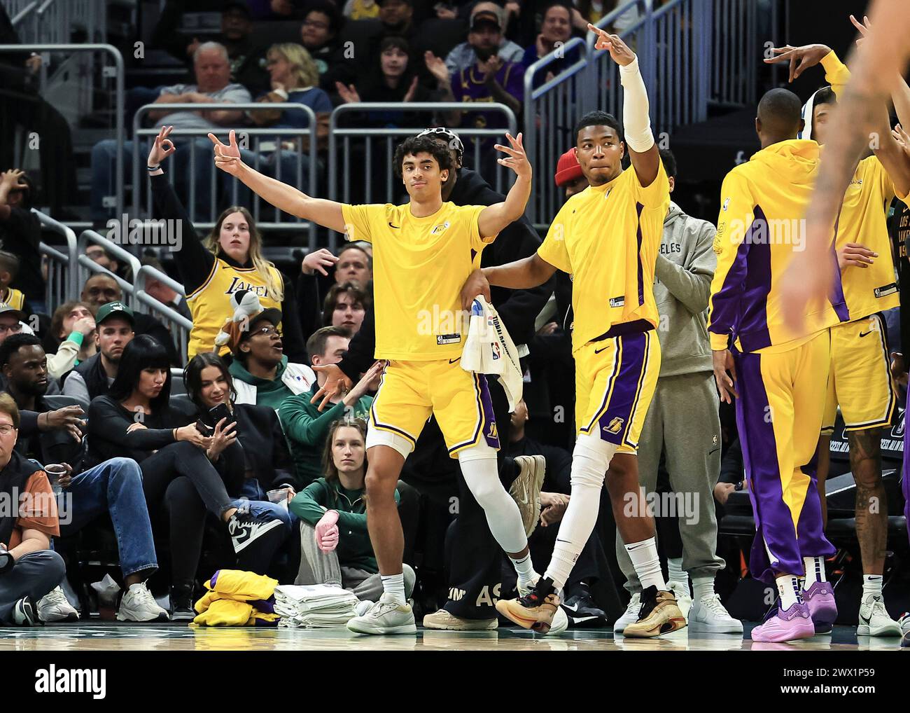 Milwaukee, USA. 26th Mar, 2024. Los Angeles Lakers' bench players ...