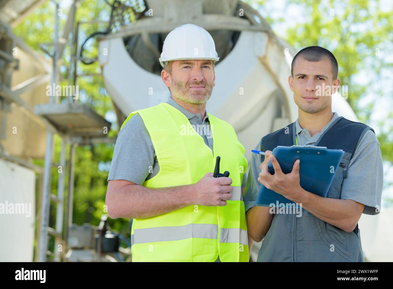 two men on work site Stock Photo - Alamy