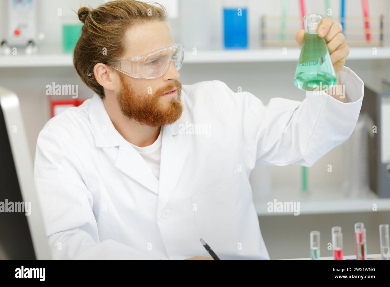 man in the lab testing new cleaning solution detergent Stock Photo - Alamy