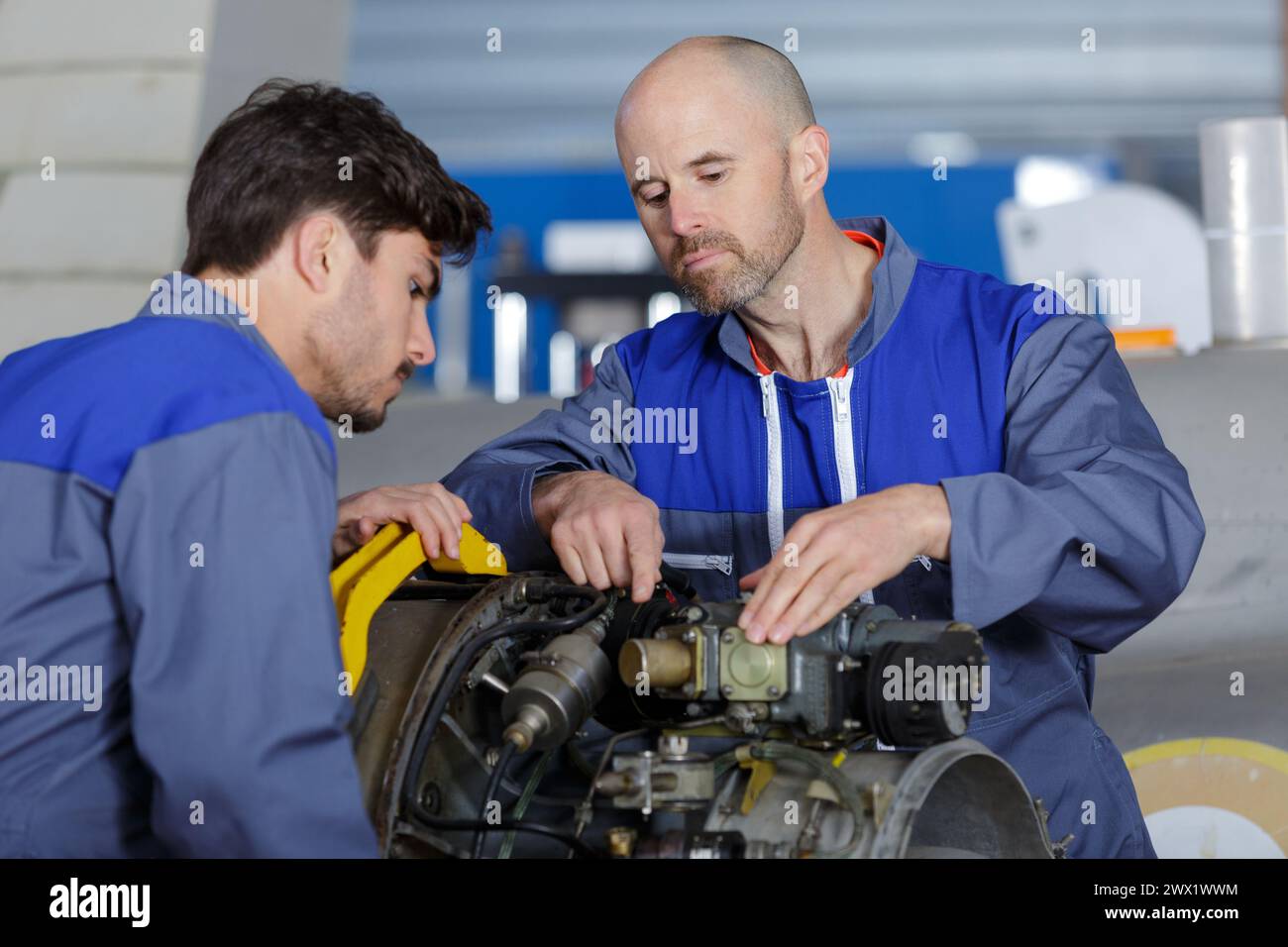 Aircraft mechanics maintenance standing hi-res stock photography and images - Alamy