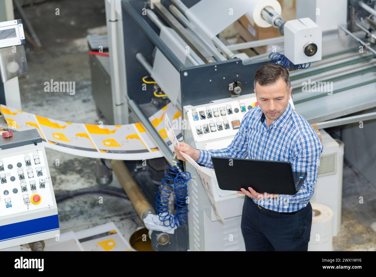 Worker in printing house people hi-res stock photography and images - Alamy
