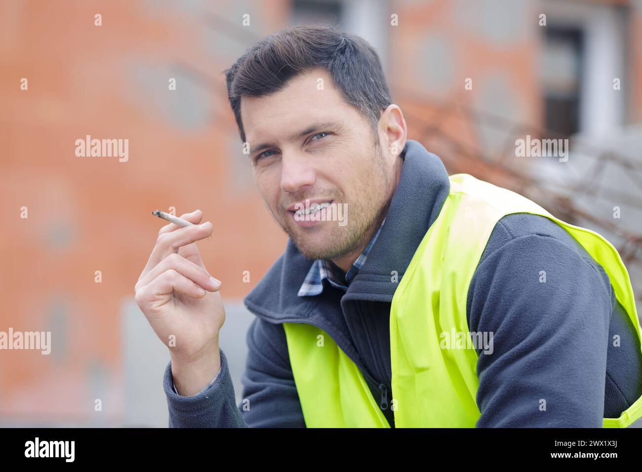 Man smoking a cigaret hi-res stock photography and images - Alamy