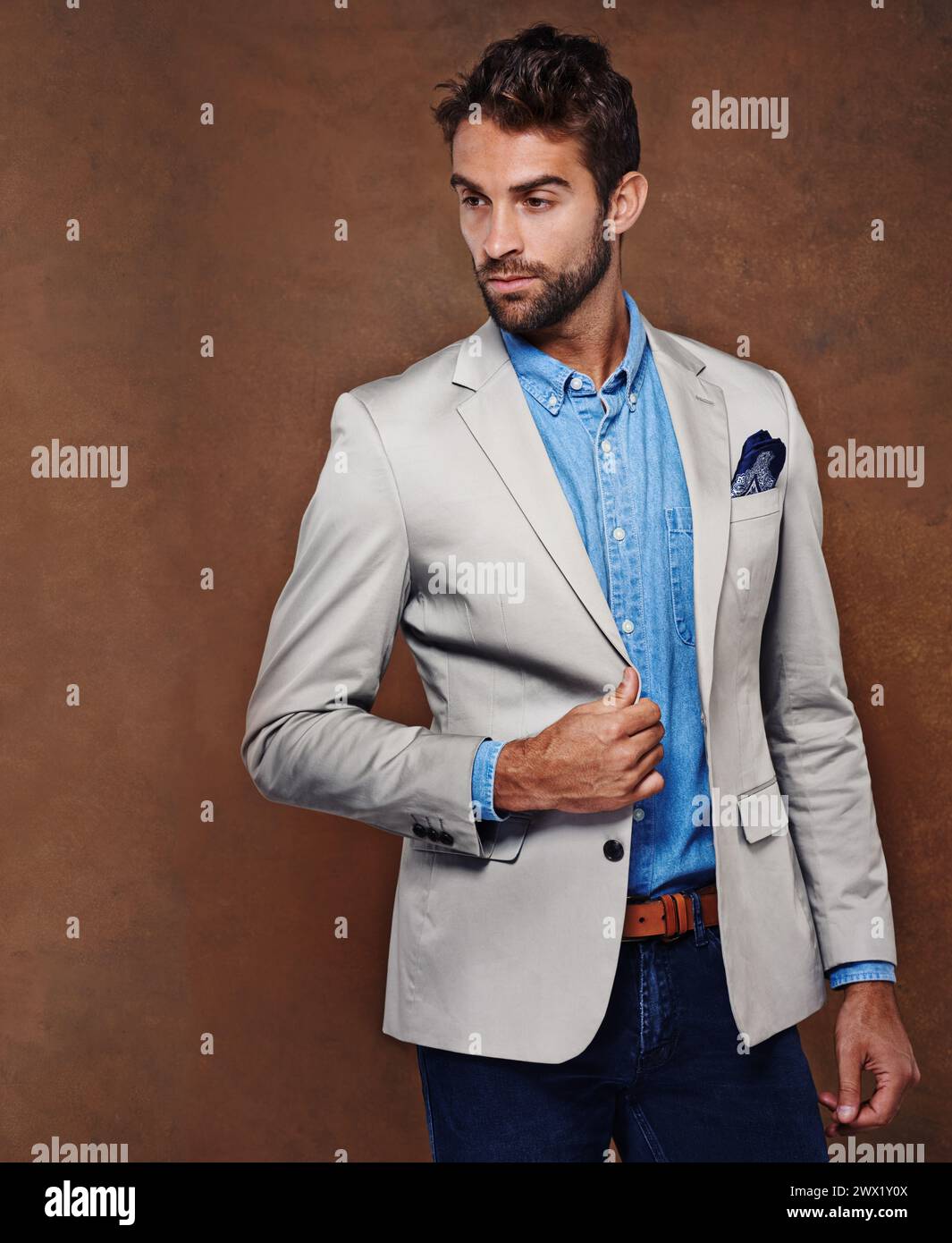 Serious, man and fashionable in studio background for confidence, style ...