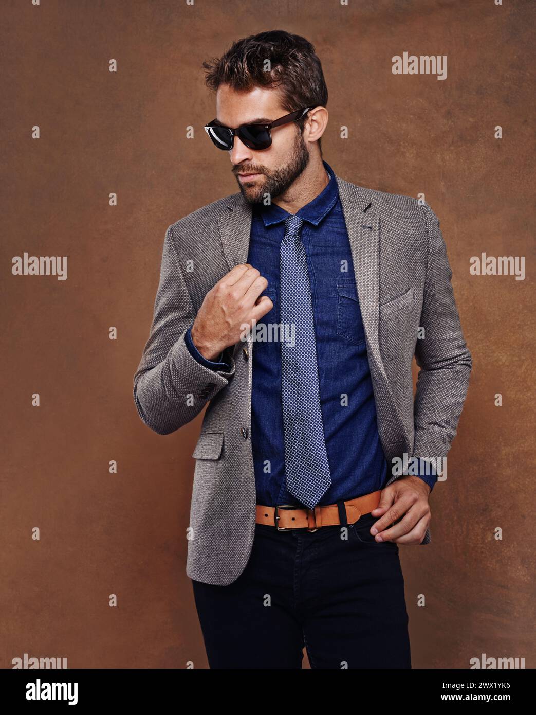 Confident, sunglass fashion and male model in studio for corporate ...