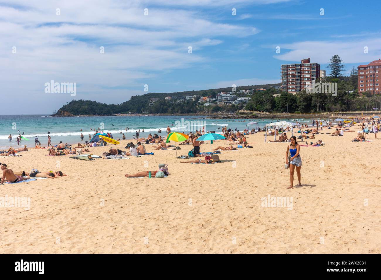 Busy summer parasols coast coastal beaches promenade manly beach hi-res ...