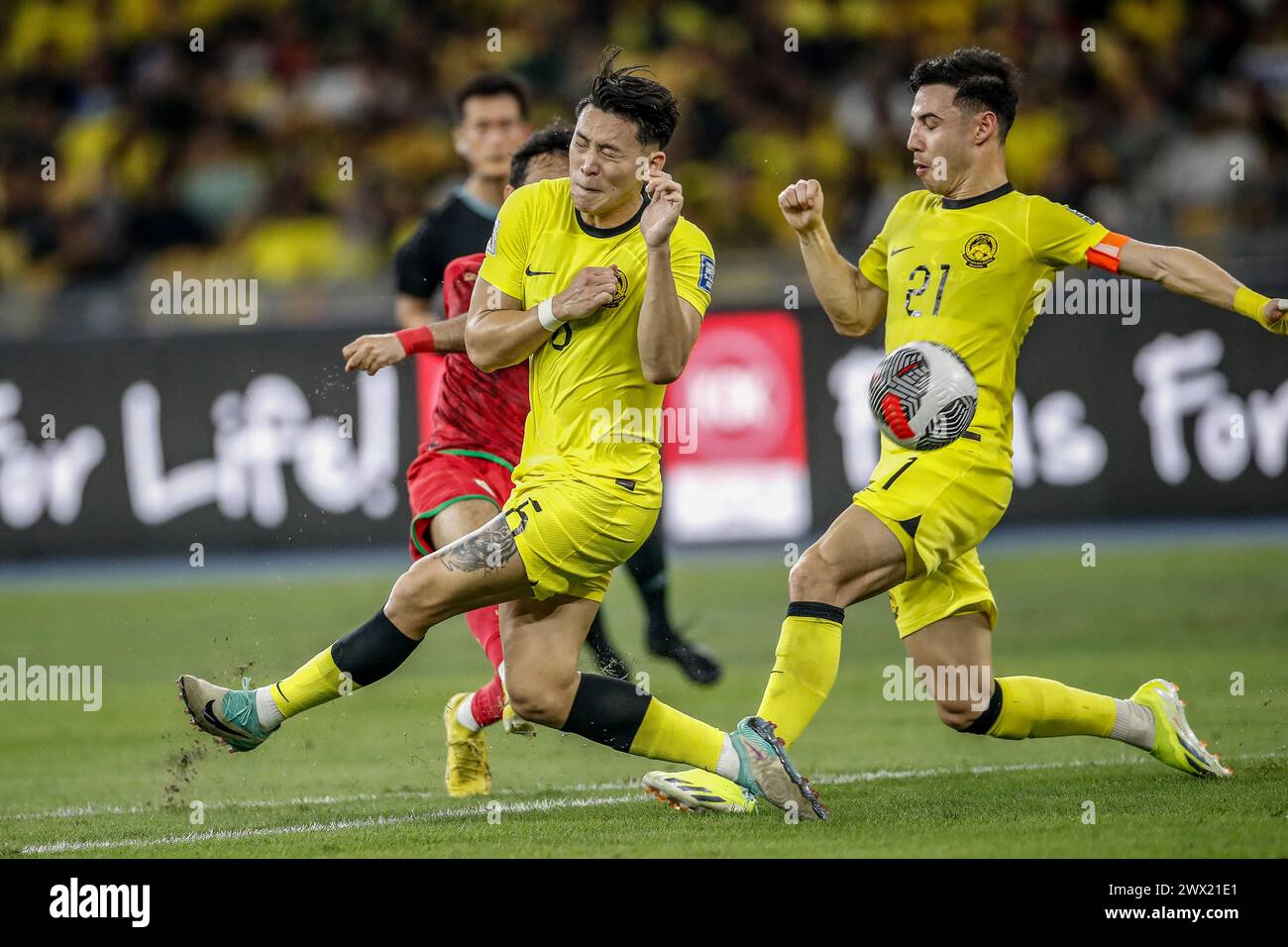 Dominic Tan (L) and Dion Cools (R) of Malaysia in action during the ...