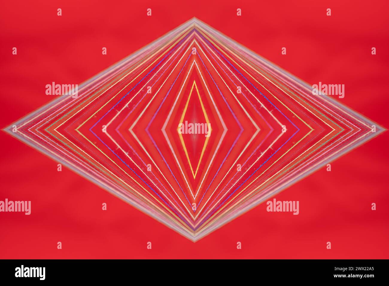 Converging Multi-colored Sewing Thread on a red background Stock Photo ...