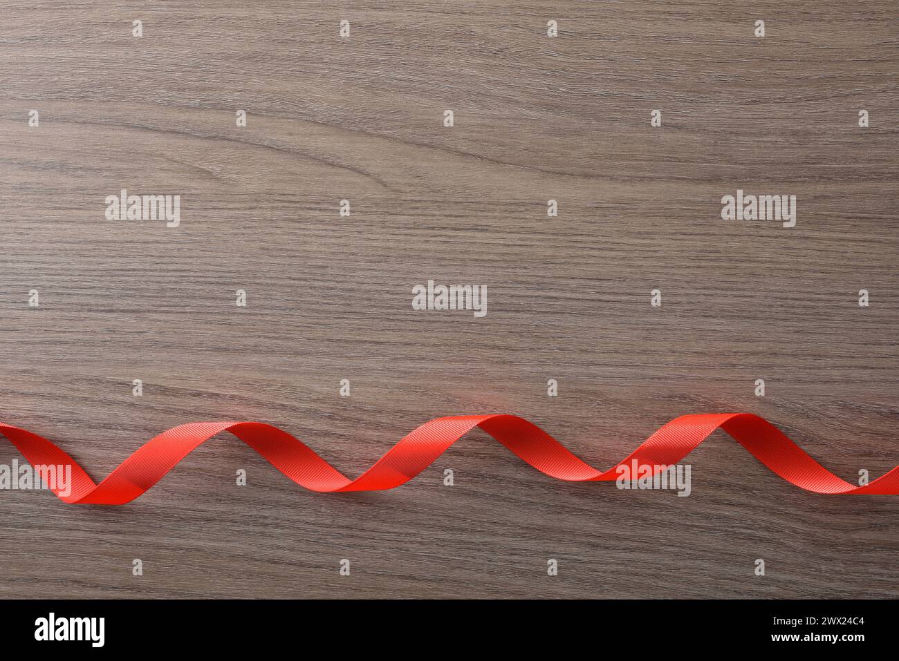 Red ribbon with waves at the bottom for decoration of backgrounds for ...