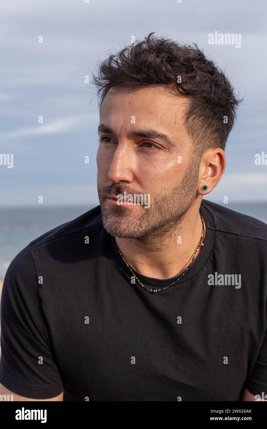 Barefoot man walking on the beach in the desert Stock Photo - Alamy