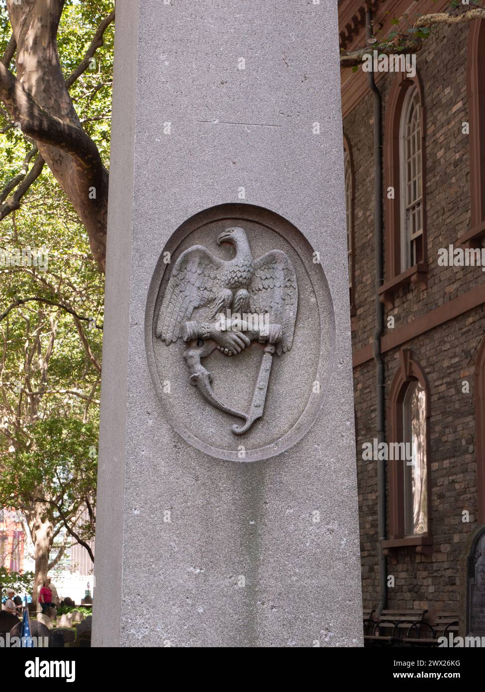 Eagle and handshake carving in stone on a pillar, New York City, New ...
