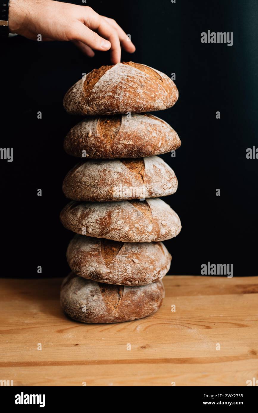 loaves of homemade black bread one on the other Stock Photo - Alamy