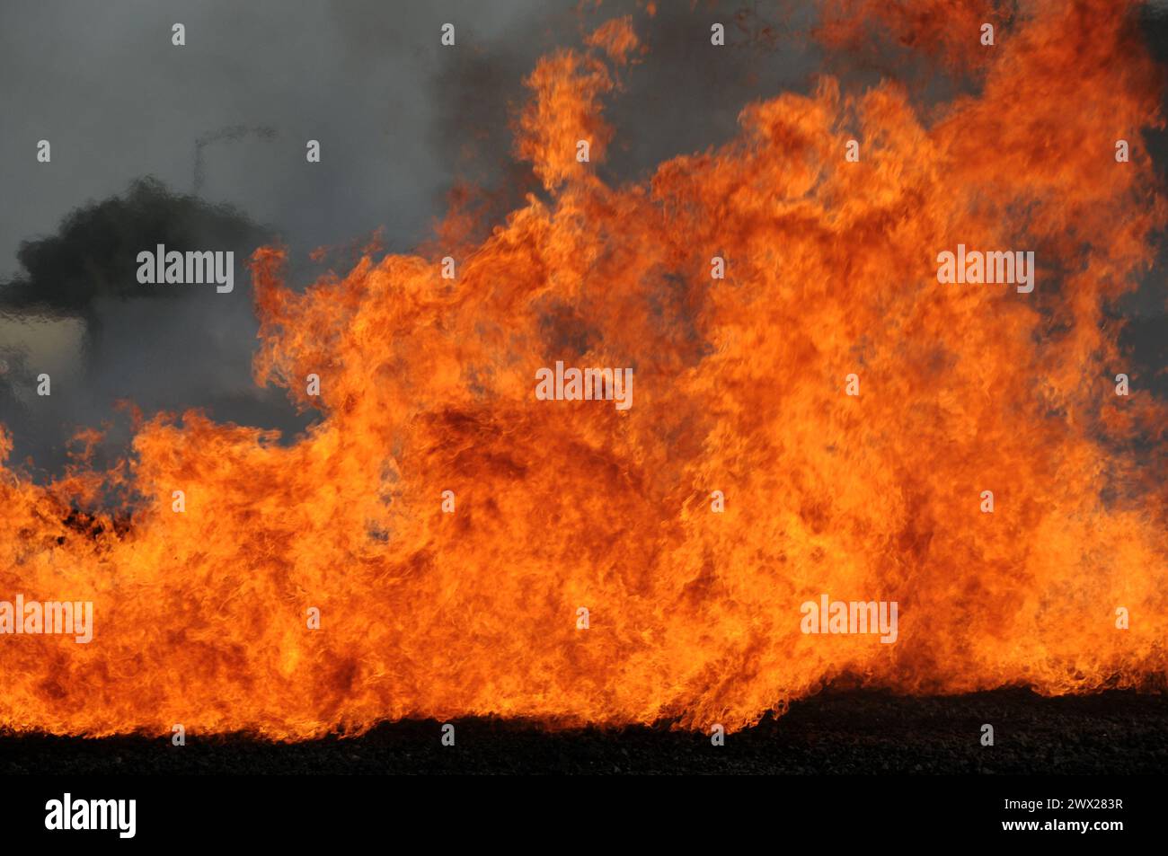 Flames from Airport Fire Training Pit (Tight), Texas Stock Photo - Alamy