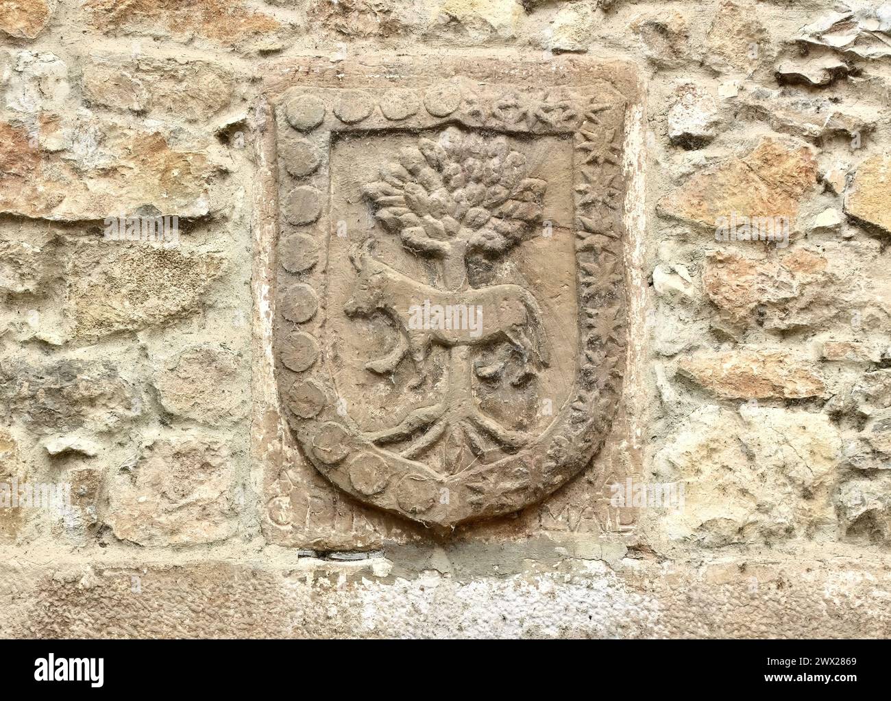 Close up coat of arms over the entrance door to the Molino del Capitán ...