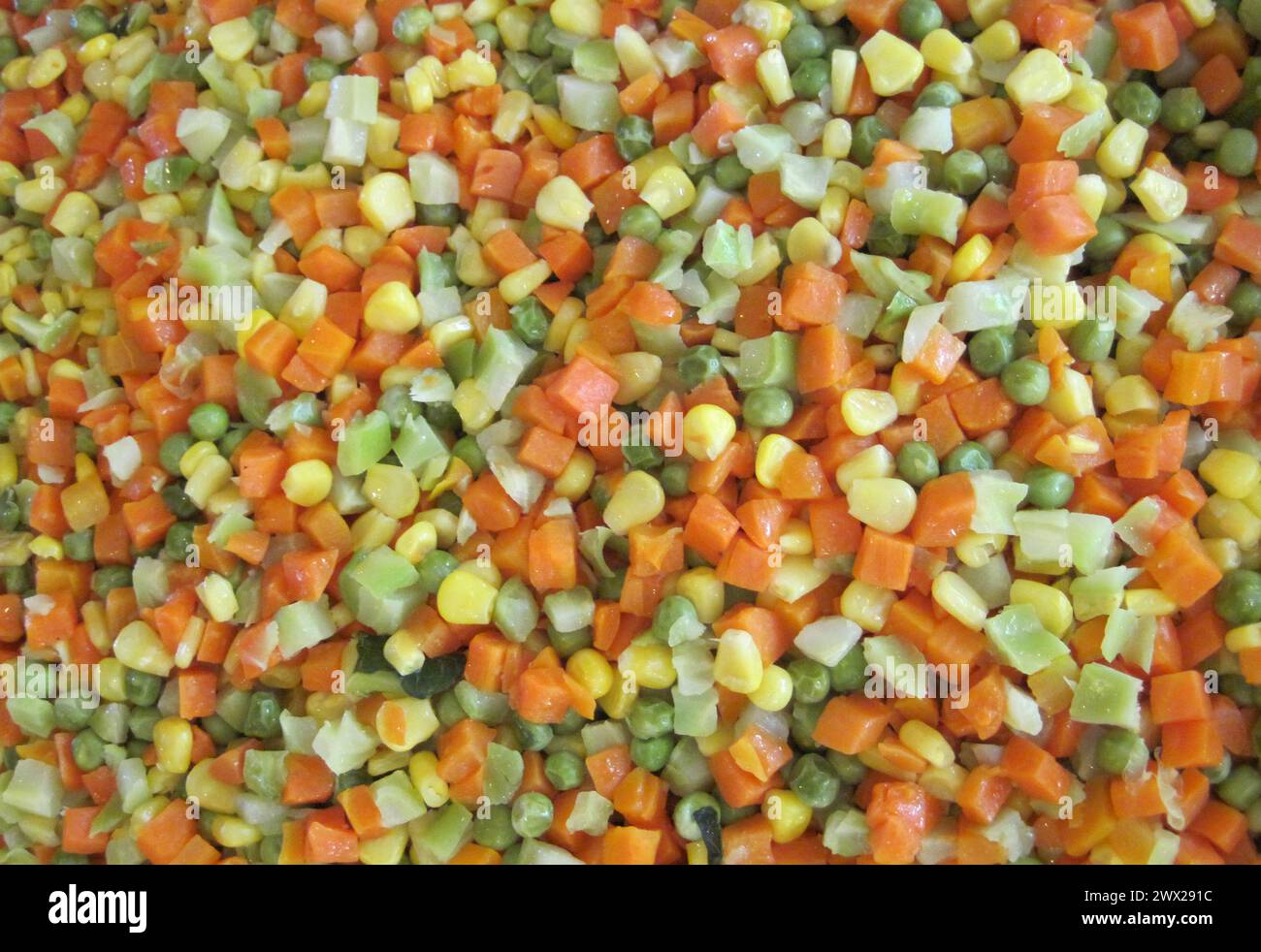 carrot corn pea as easy vegetarian background Stock Photo - Alamy