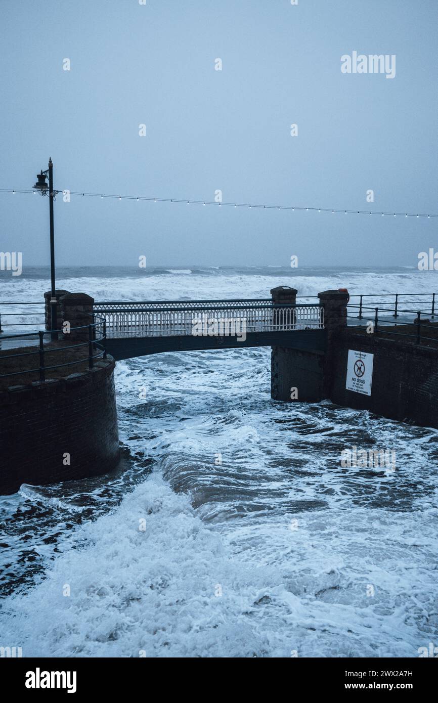 High tide on the seafront in the town of Filey on the Yorkshire Coast ...