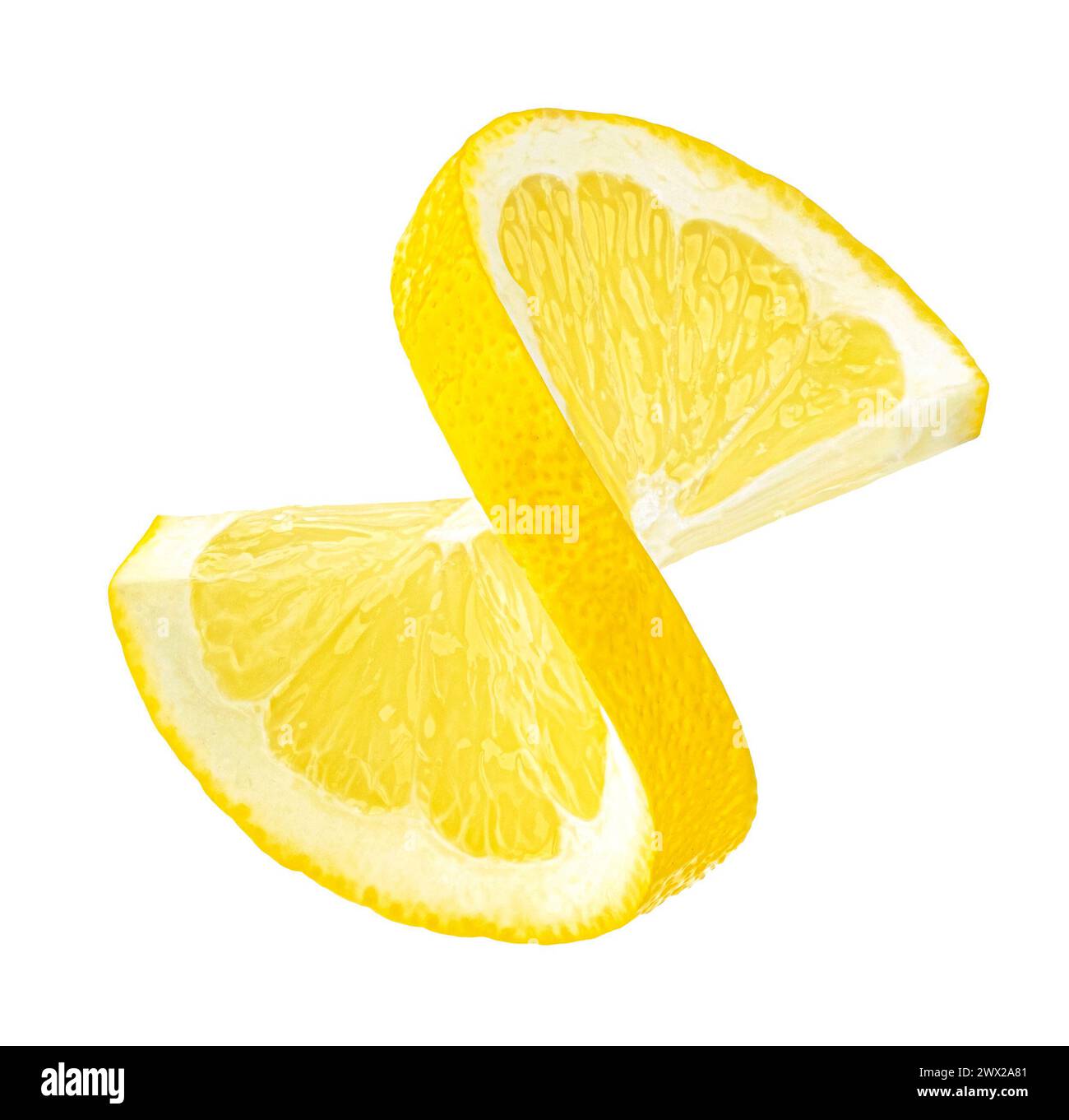 Twisted lemon slice isolated on white background, full depth of field ...