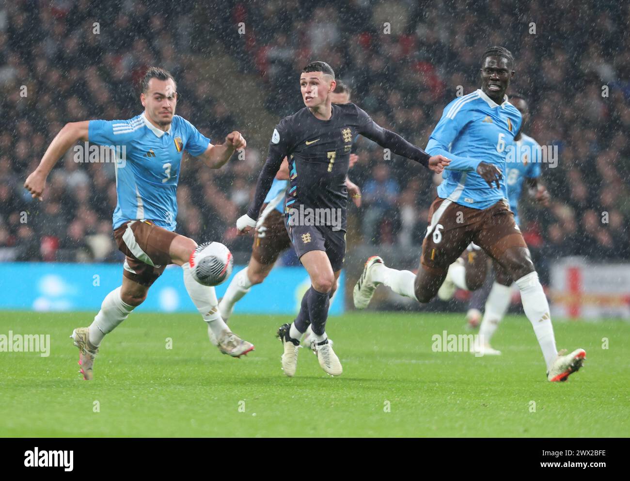 L-R Arthur Theate(Rennes)of Belgium Phil Foden (Man City)of England and ...