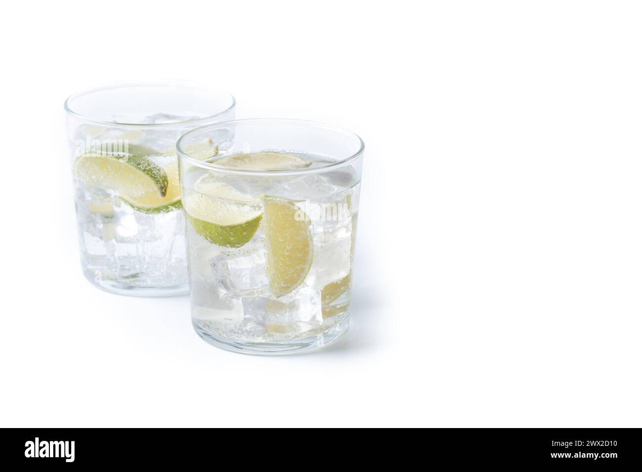 Glass of vodka tonic cocktail isolated on white background Stock Photo ...