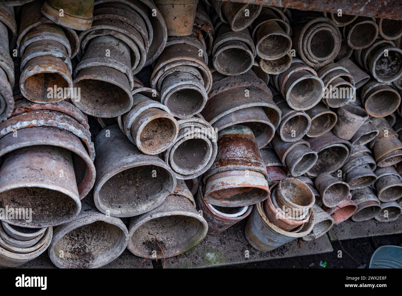 Closeup background of old flower pots with selective focus. Clay ...