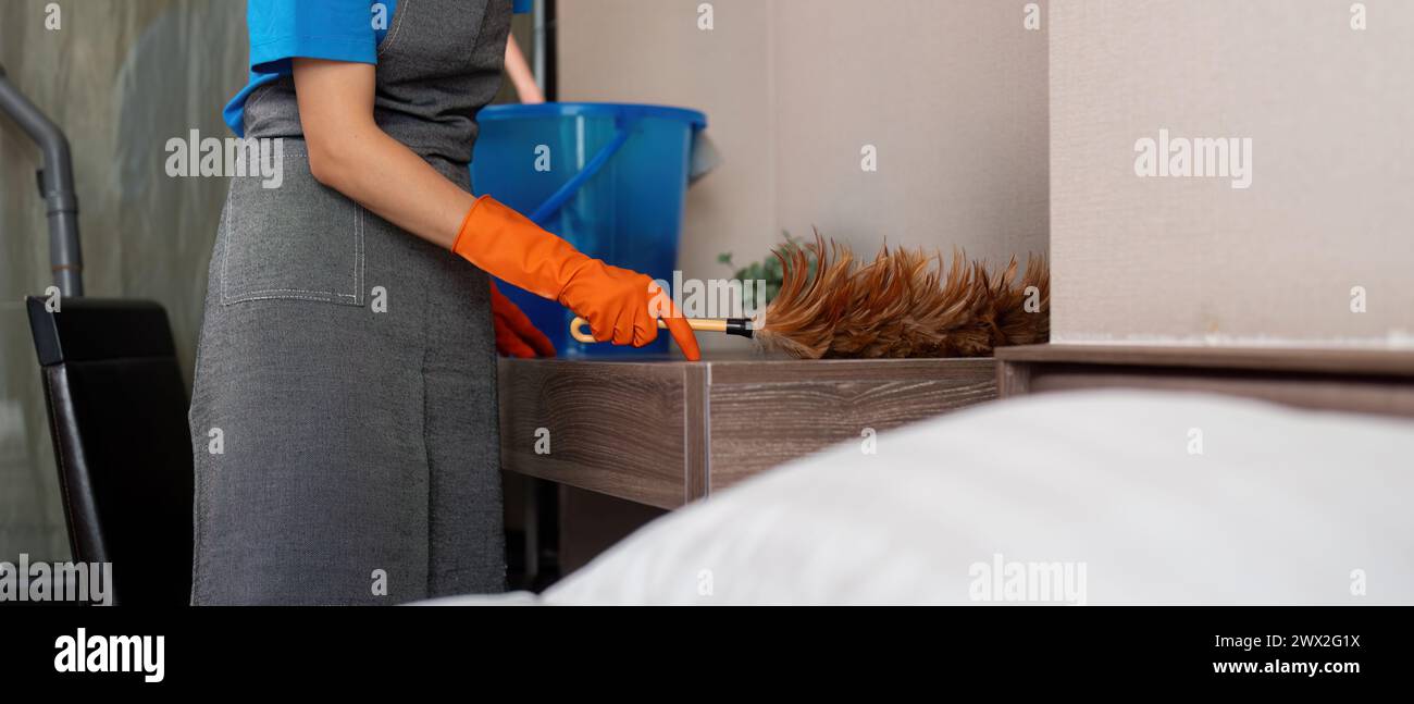Girl with feather duster hi-res stock photography and images - Alamy
