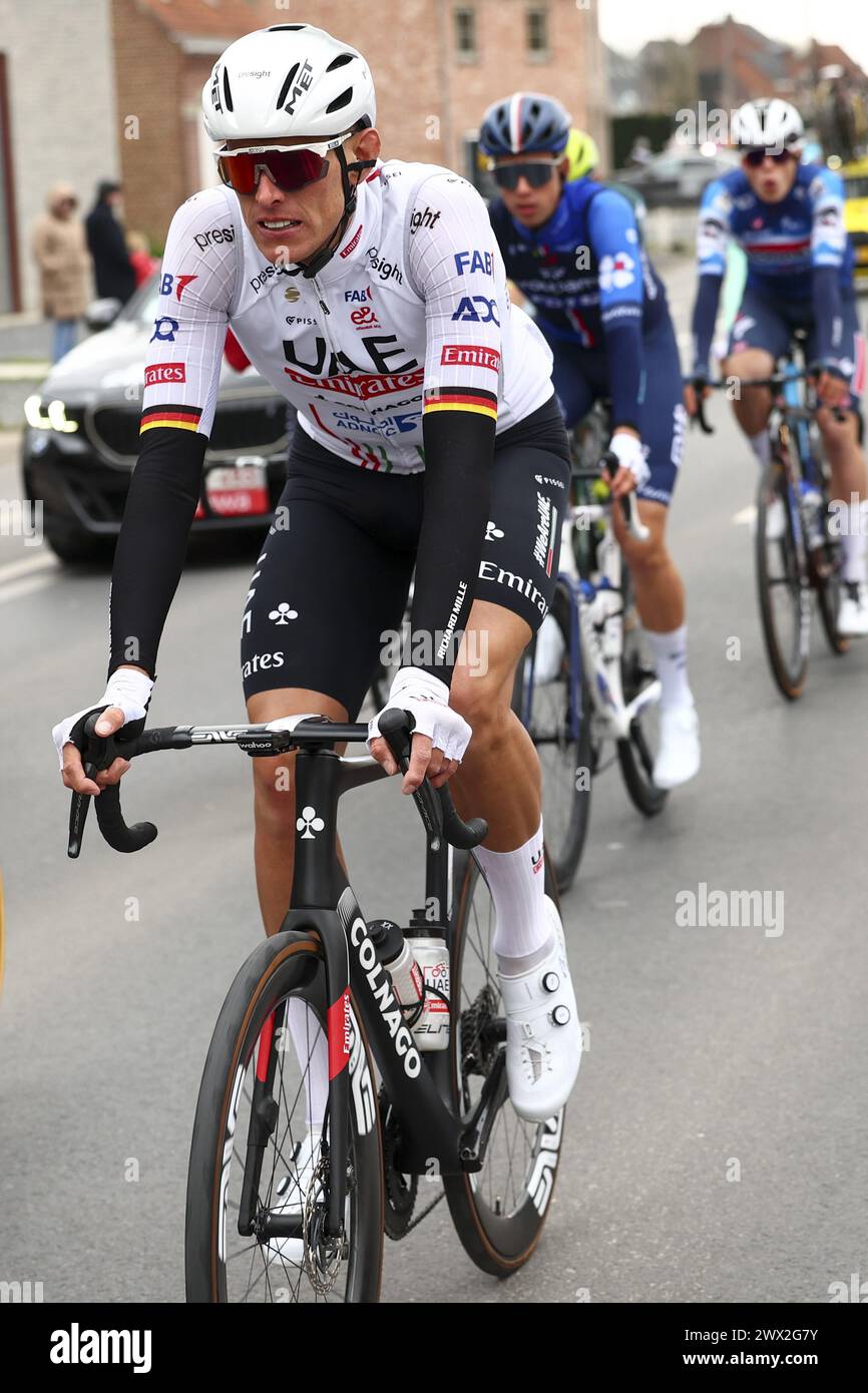 Waregem, Belgium. 27th Mar, 2024. German Nils Politt of UAE Team ...
