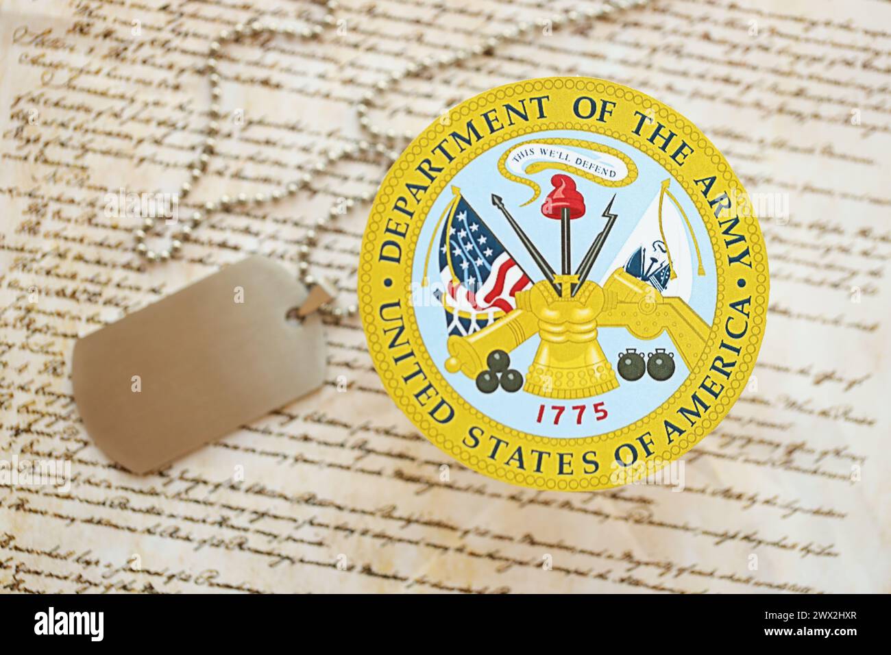 KYIV, UKRAINE - MARCH 9, 2024 US Department of Army seal with dogtags ...