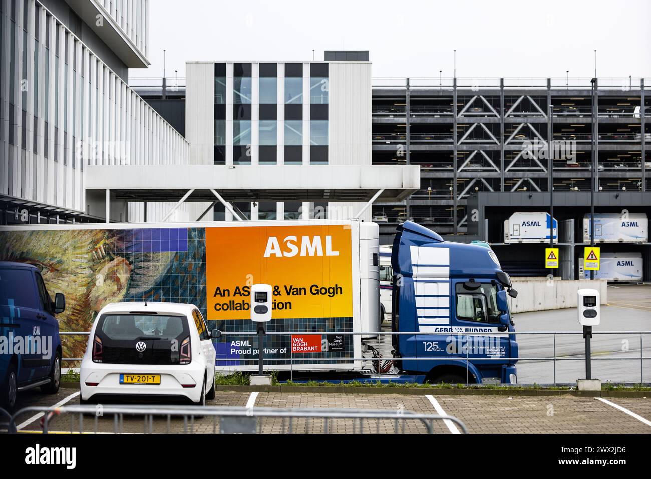 VELDHOVEN - Containers with chip machines from ASML. Prime Minister ...