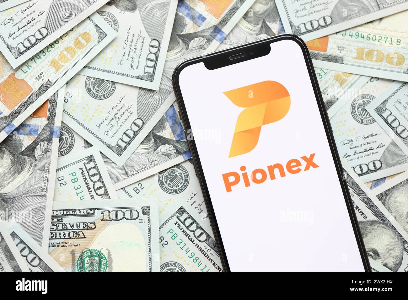 KYIV, UKRAINE - MARCH 15, 2024 Pionex logo on iPhone display screen ...