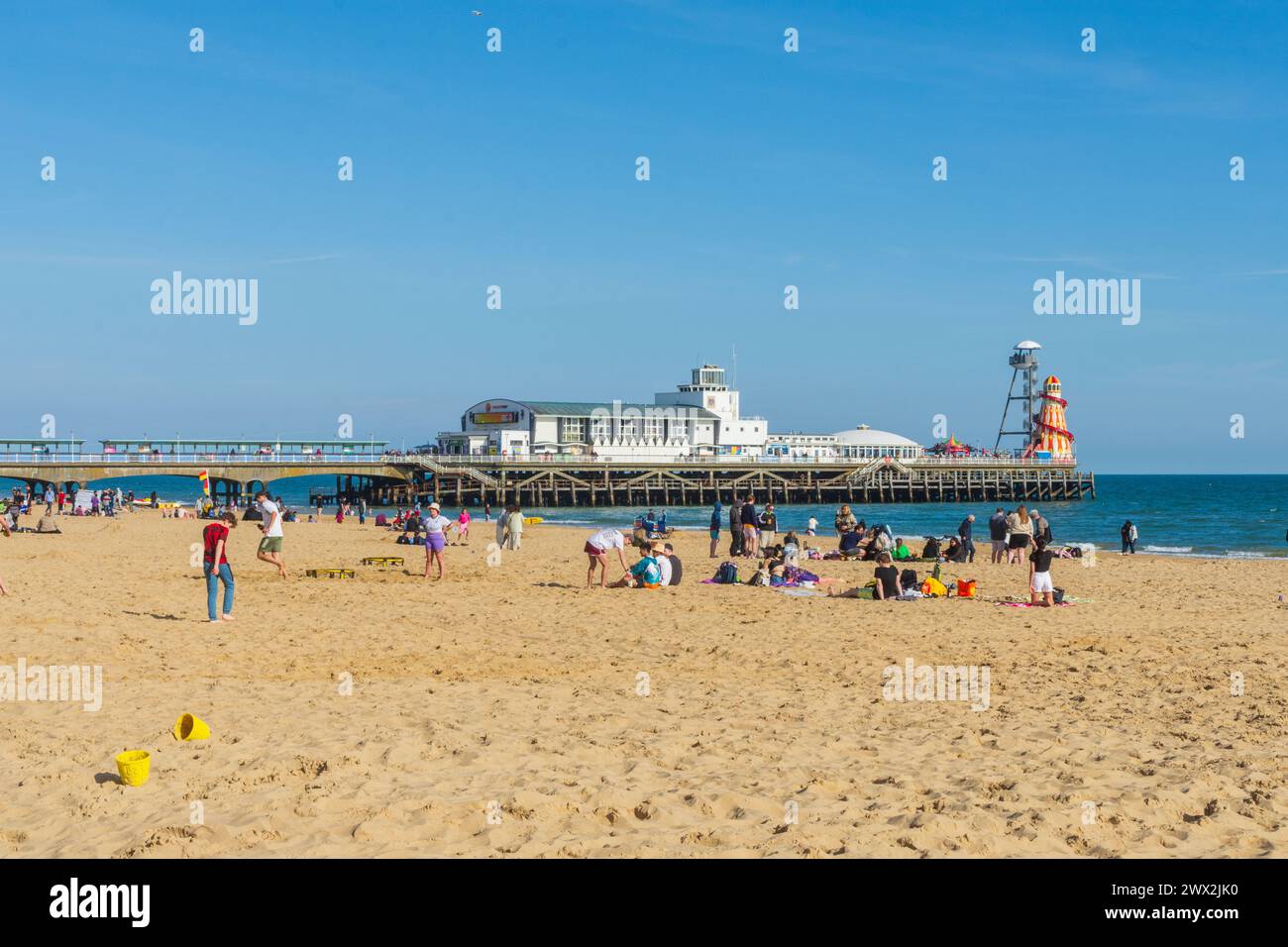 Bournemouth, UK - April 8th 2023: People on the beach in front of ...
