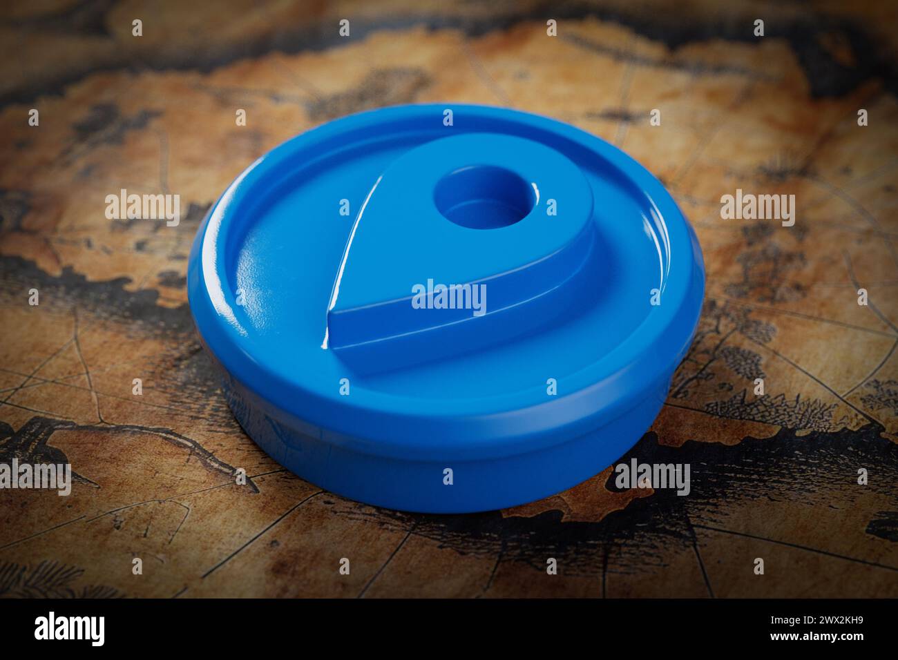 Blue Plastic Map Pointer Destination Pin on an old map extreme closeup ...