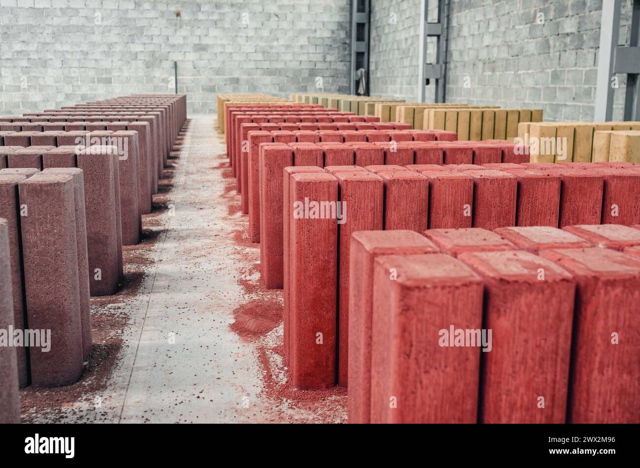Drying of finished paving stones at the factory. Concrete palisades ...