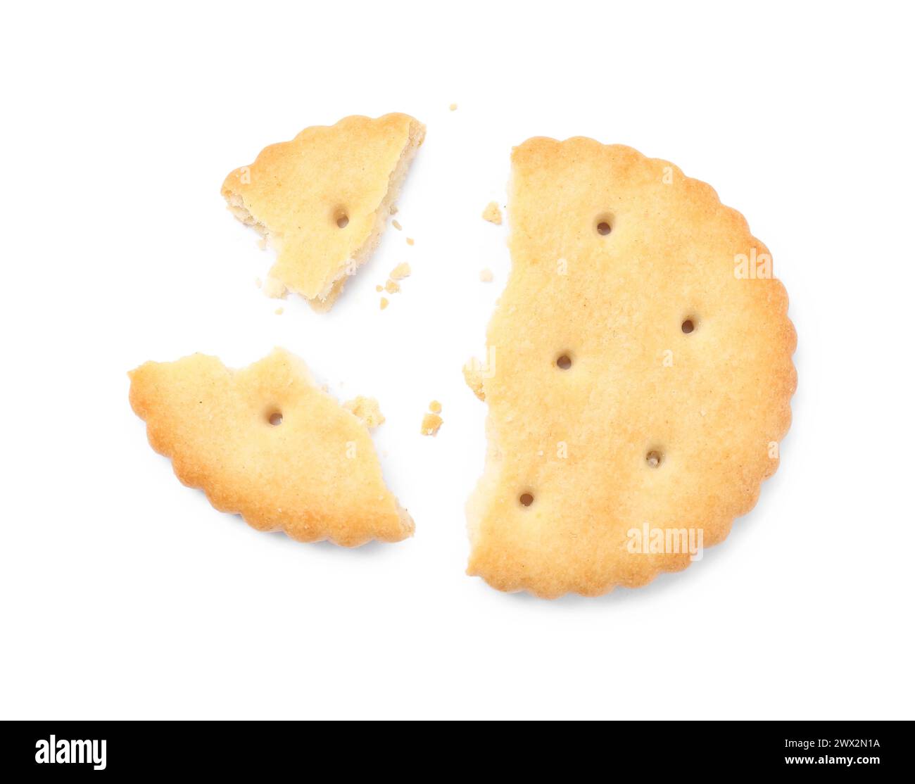 Crispy broken cracker isolated on white, top view Stock Photo - Alamy