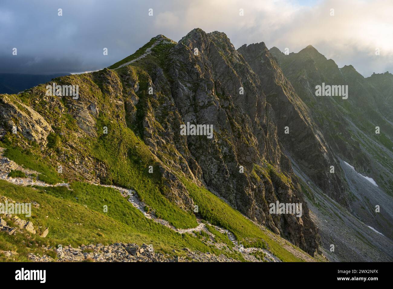 Steep hike path to Krzyzne Pass in Tatra Mountains at summer day ...